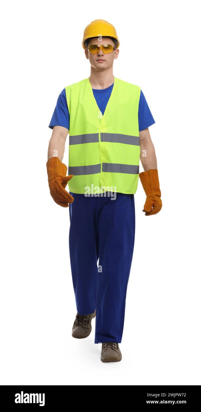 Young man wearing safety equipment on white background Stock Photo - Alamy