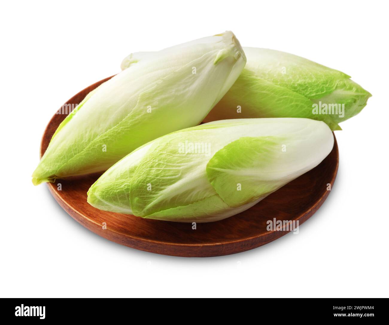 Raw ripe chicories on white background. Belgian endive Stock Photo - Alamy