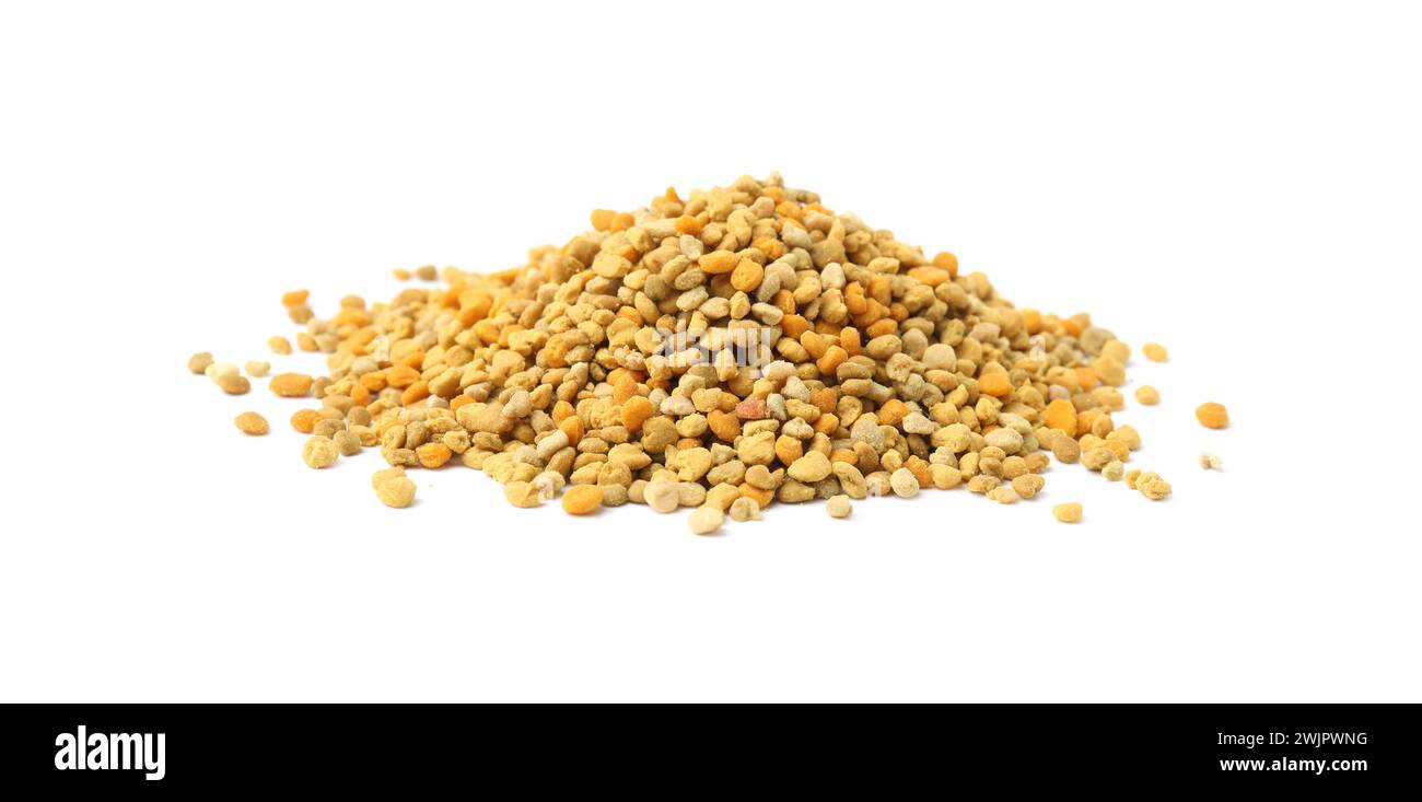 Pile of fresh bee pollen granules isolated on white Stock Photo - Alamy