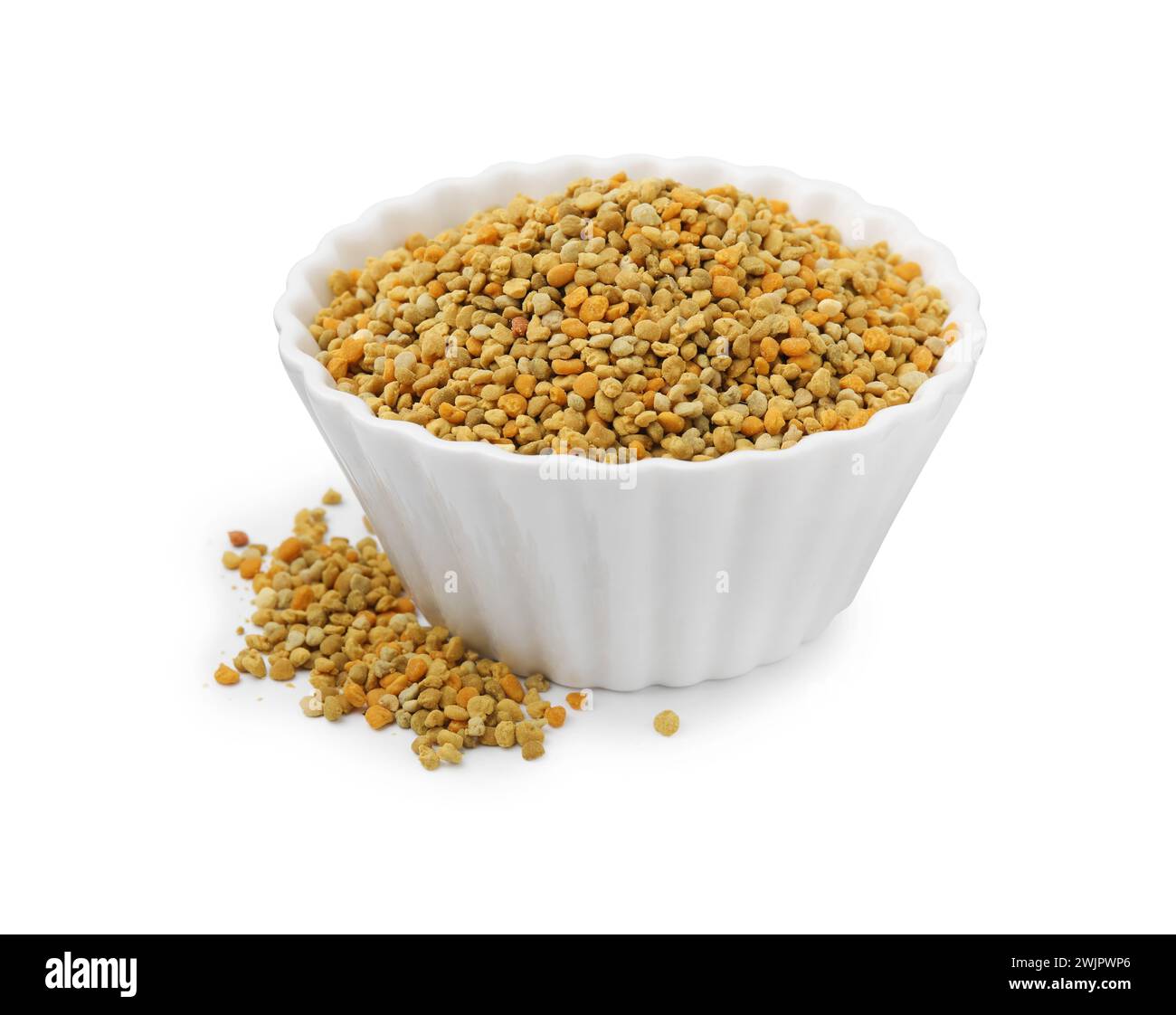 Fresh bee pollen granules in bowl isolated on white Stock Photo - Alamy