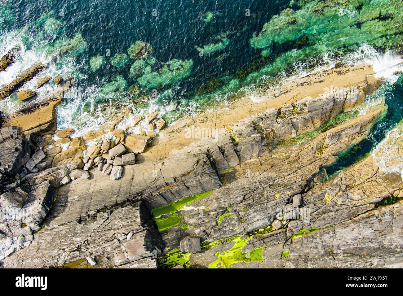 Aerial view of rough and rocky shore along famous Ring of Kerry route ...