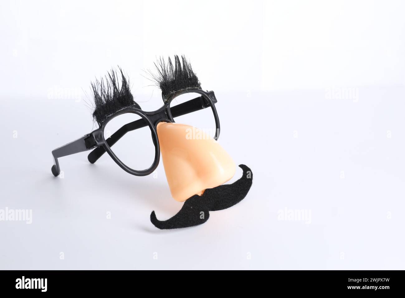 Funny mask with fake mustache, nose and glasses isolated on white Stock ...