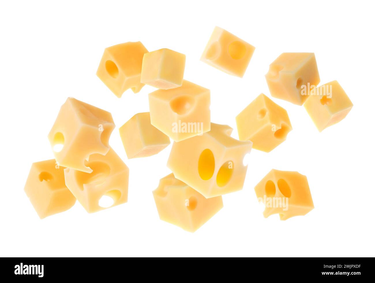 Pieces of cheese flying on white background Stock Photo - Alamy