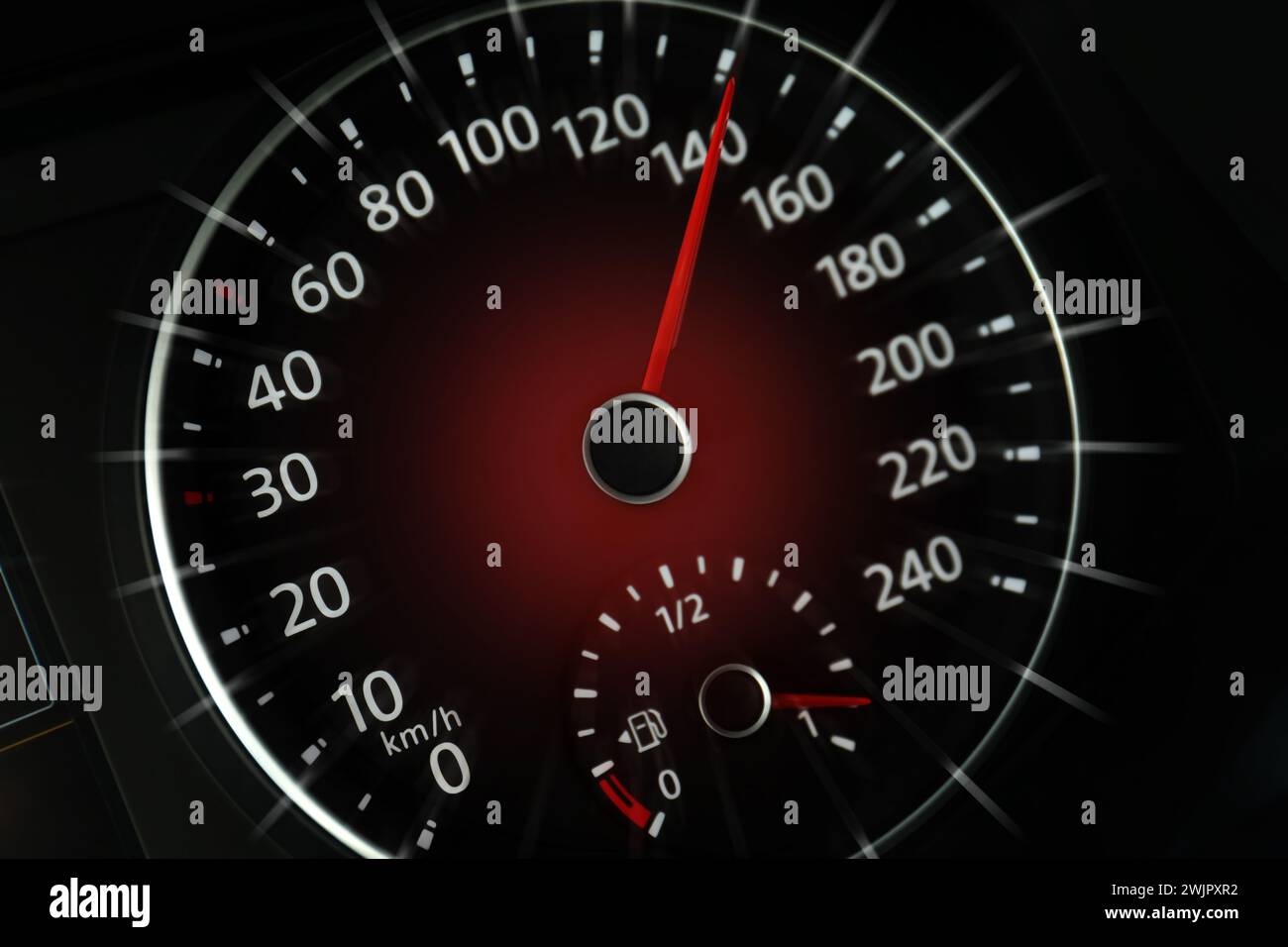 Speedometer on car dashboard, closeup. Motion blur effect Stock Photo ...