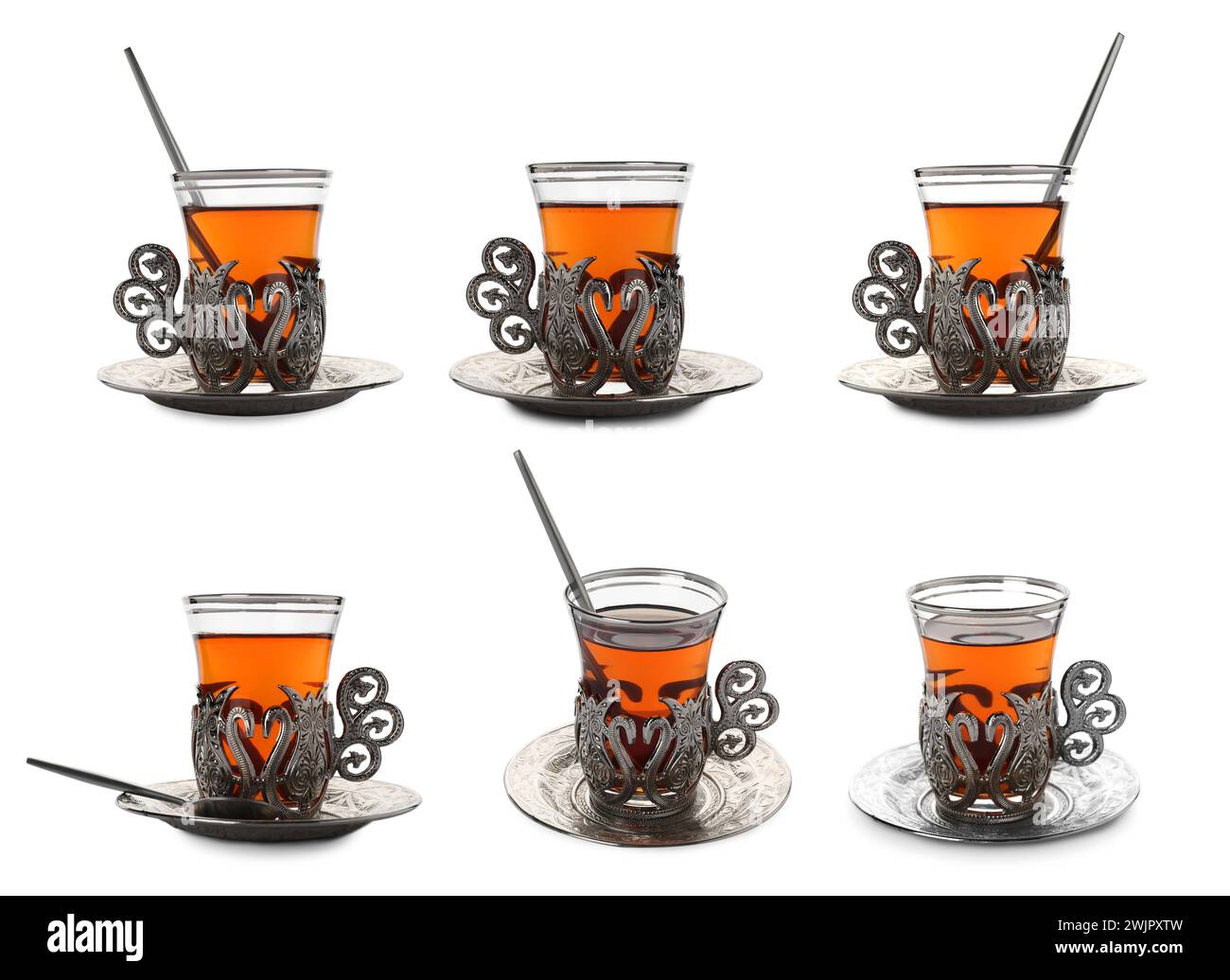 Glasses of traditional Turkish tea in vintage holders isolated on white ...