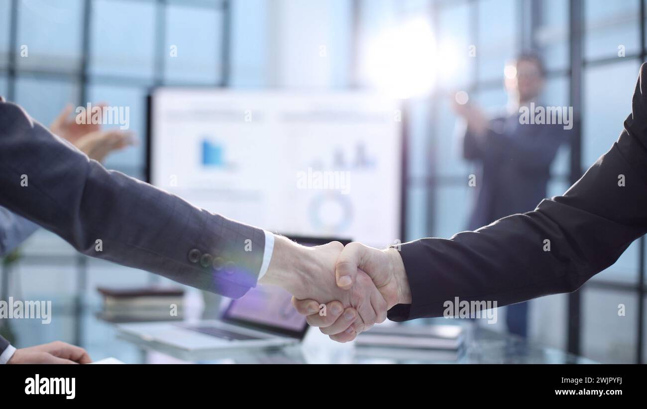 Congratulations on a successful deal with a handshake Stock Photo - Alamy
