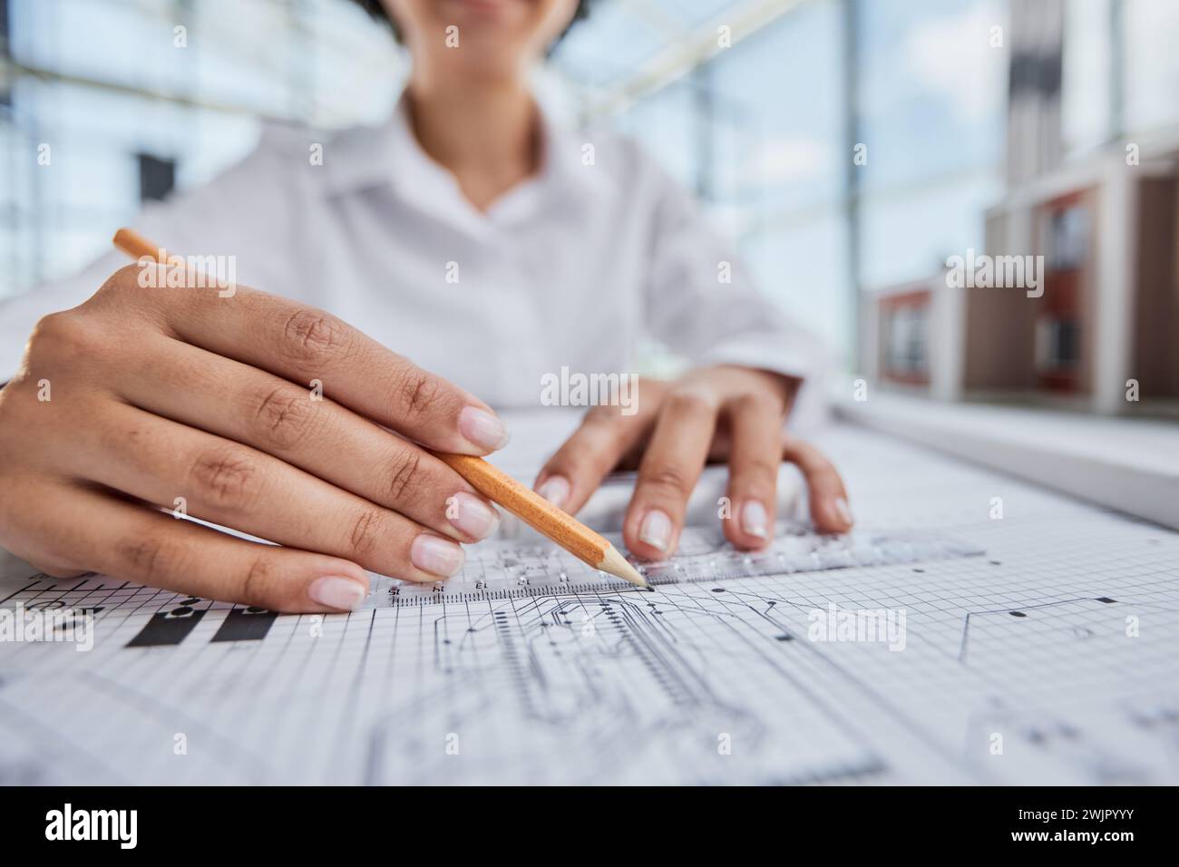 Female architect holding architectural construction hi-res stock ...