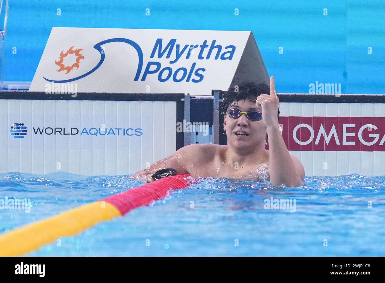 Doha, Qatar. 16th Feb, 2024. Dong Zhihao of China celebrates after ...