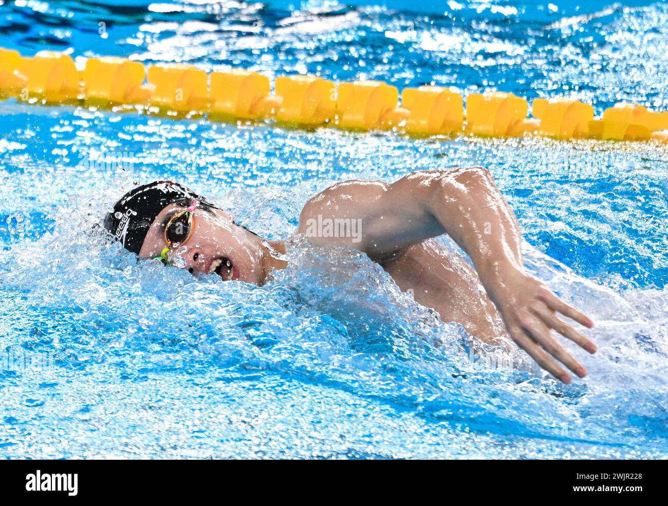 Doha, Qatar. 16th Feb, 2024. Pan Zhanle of China competes during the ...