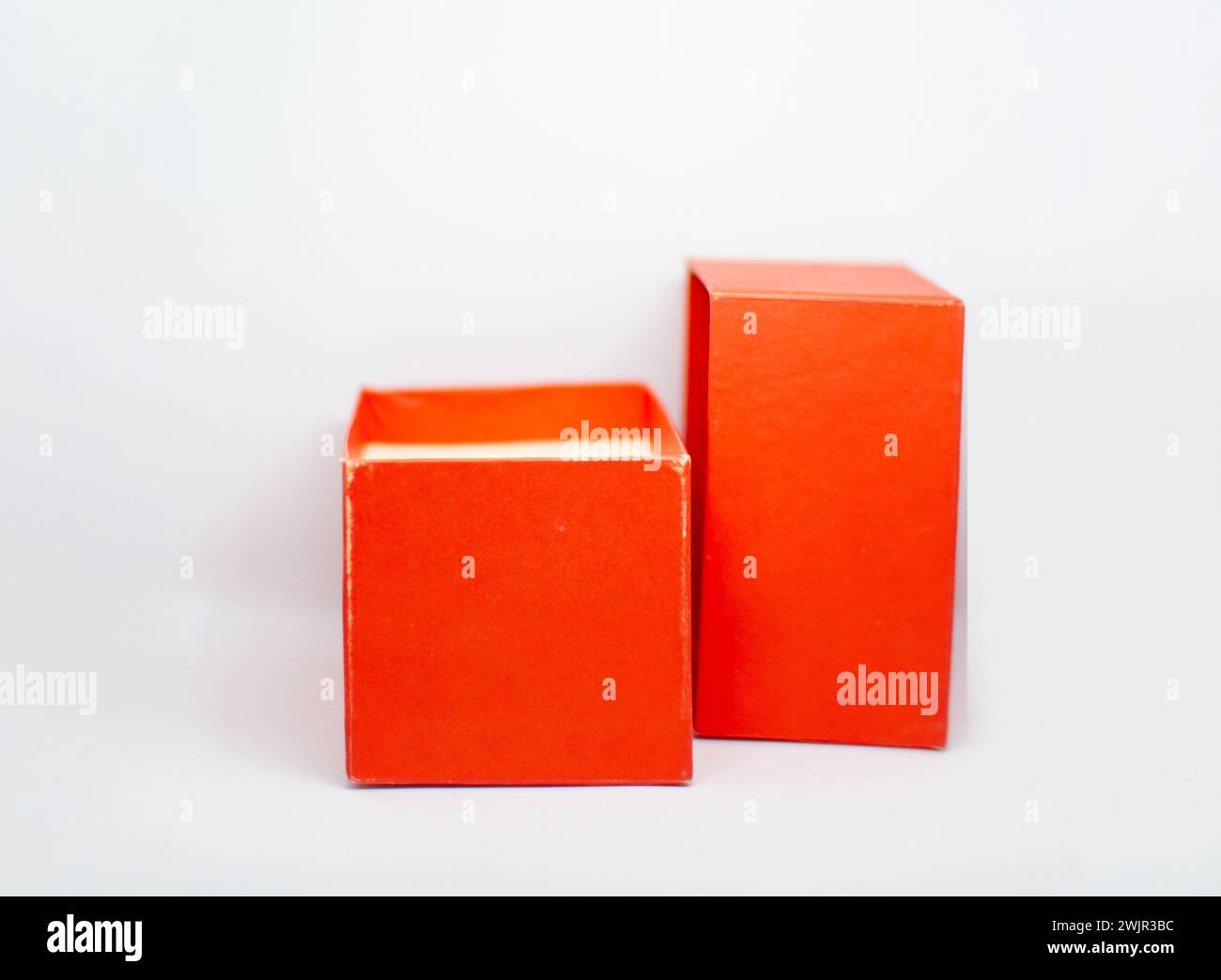 orange cube isolated on a white background Stock Photo - Alamy