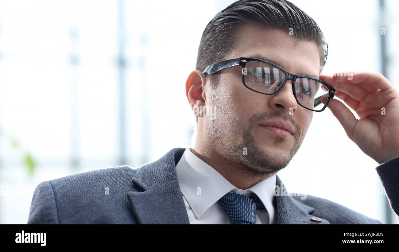 Serious man in glasses works hi-res stock photography and images - Alamy