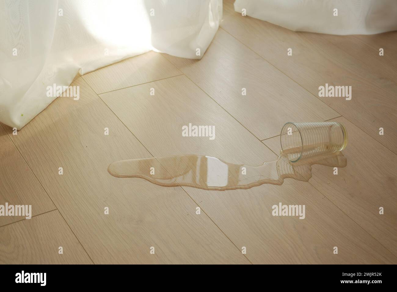 Spilled liquid puddle water hi-res stock photography and images - Alamy