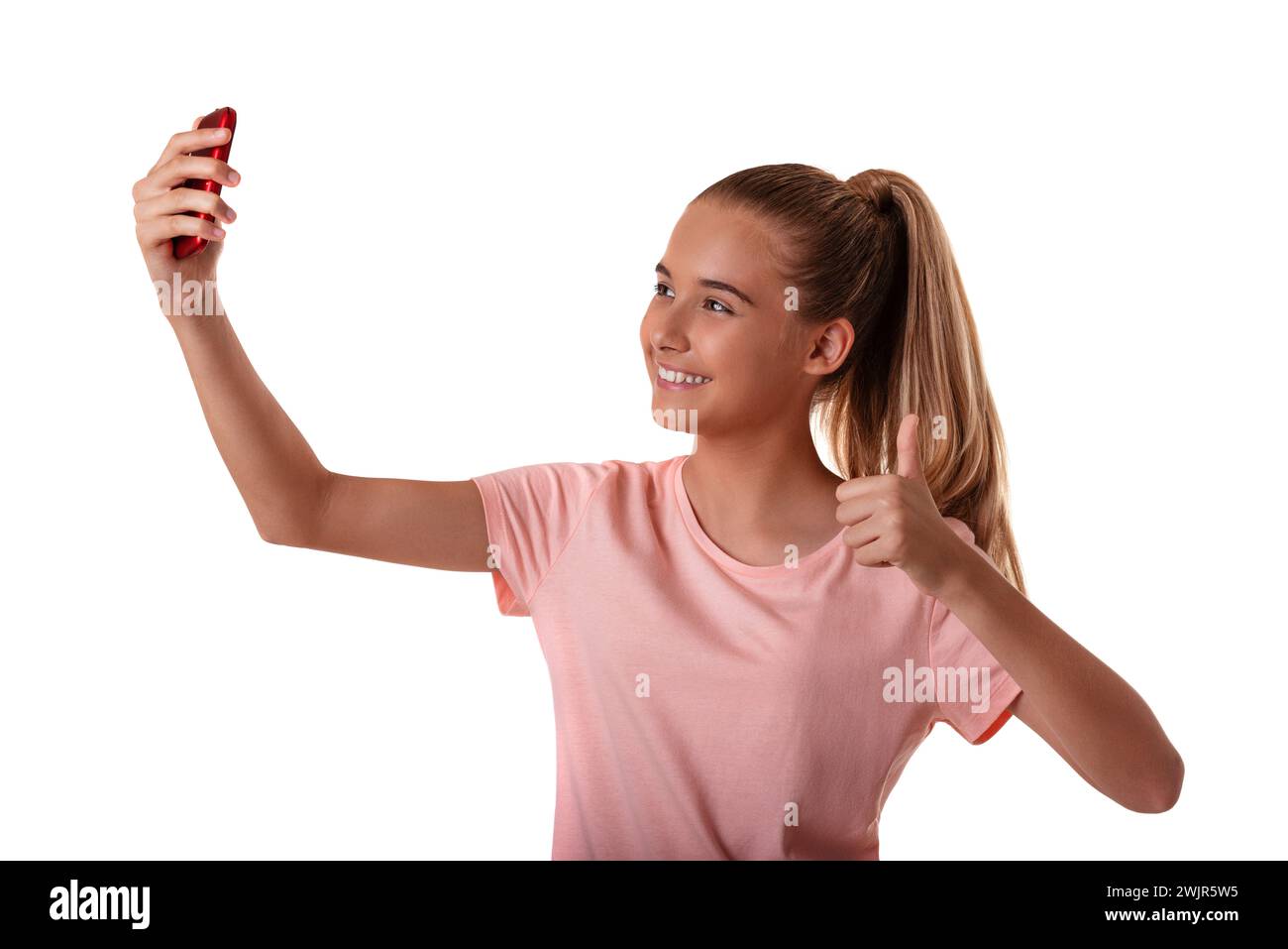 Portrait of beautiful young fit girl making selfie with smartphone and ...