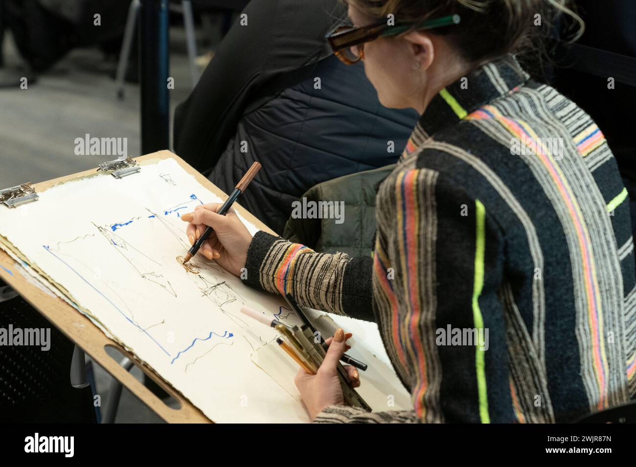 Artist creates a sketch during NYS AG Letitia James delivering remarks ...