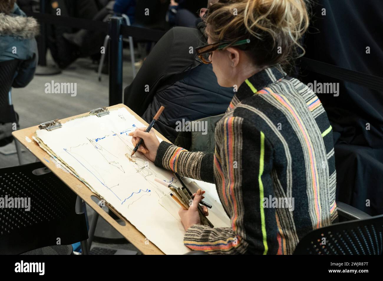 Artist creates a sketch during NYS AG Letitia James delivering remarks ...