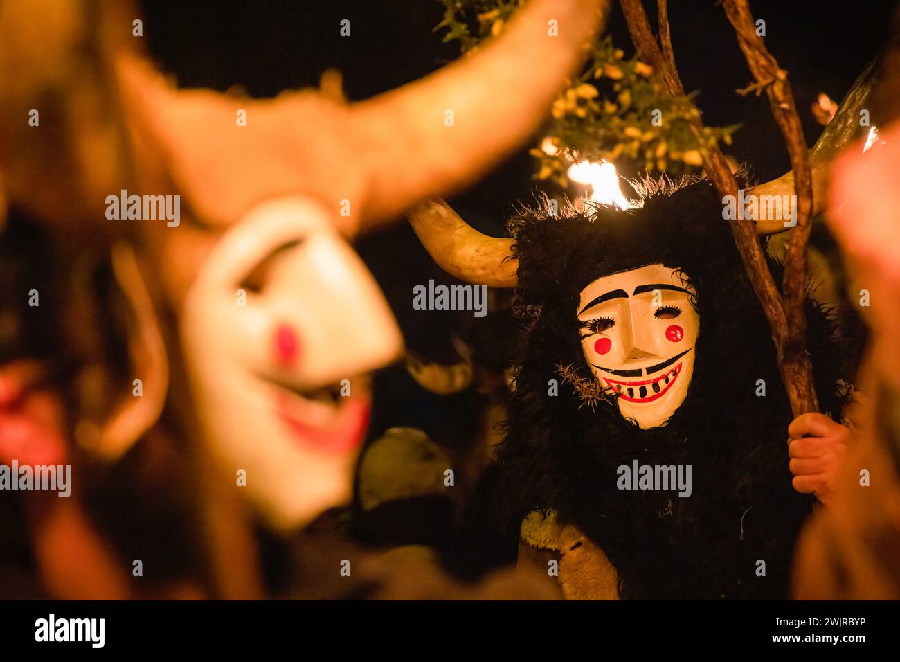 The Felos (carnival revellers of Maceda) wearing wooden masks and horns ...