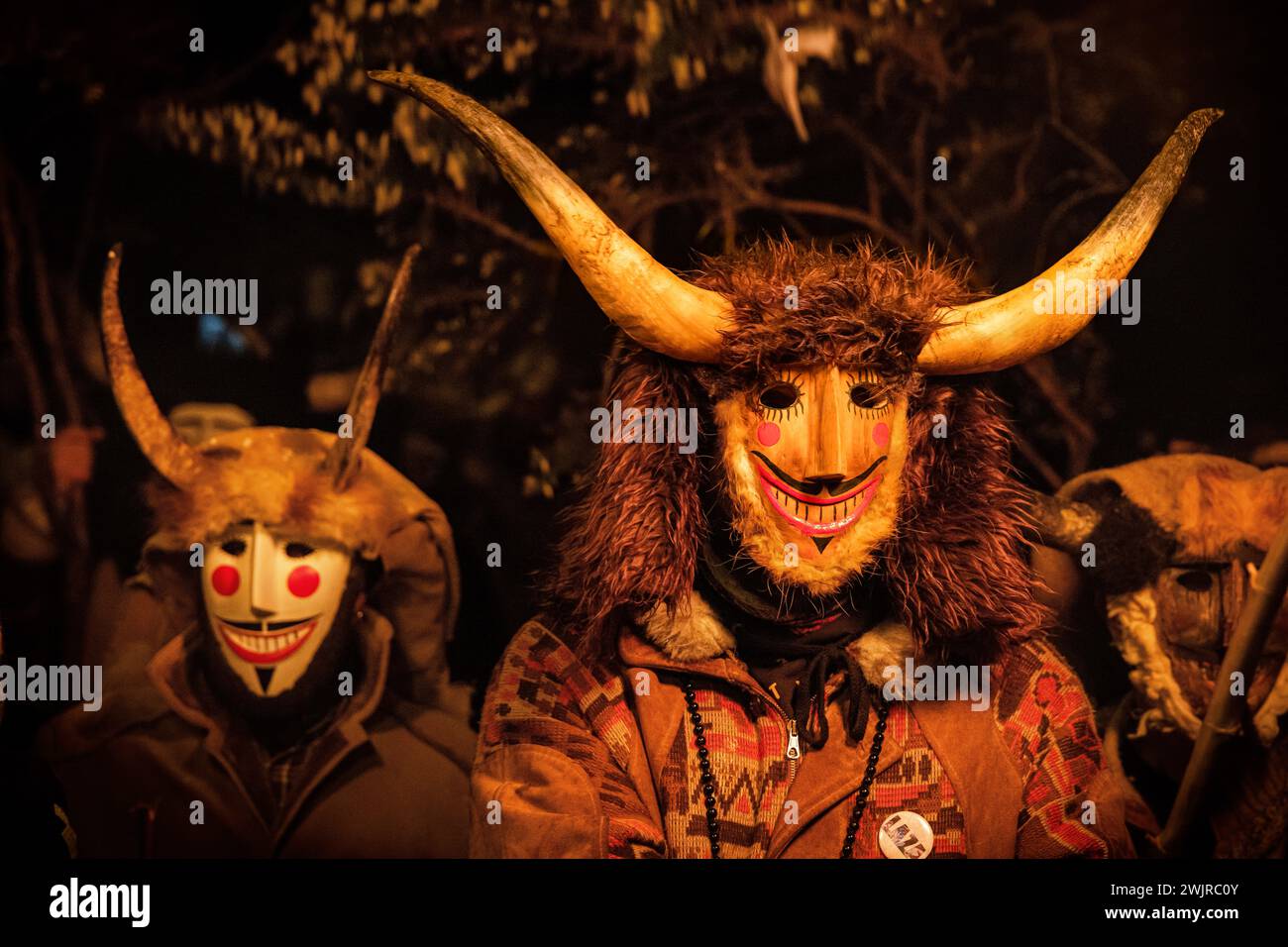 The Felos (carnival revellers of Maceda) wearing wooden masks and horns ...