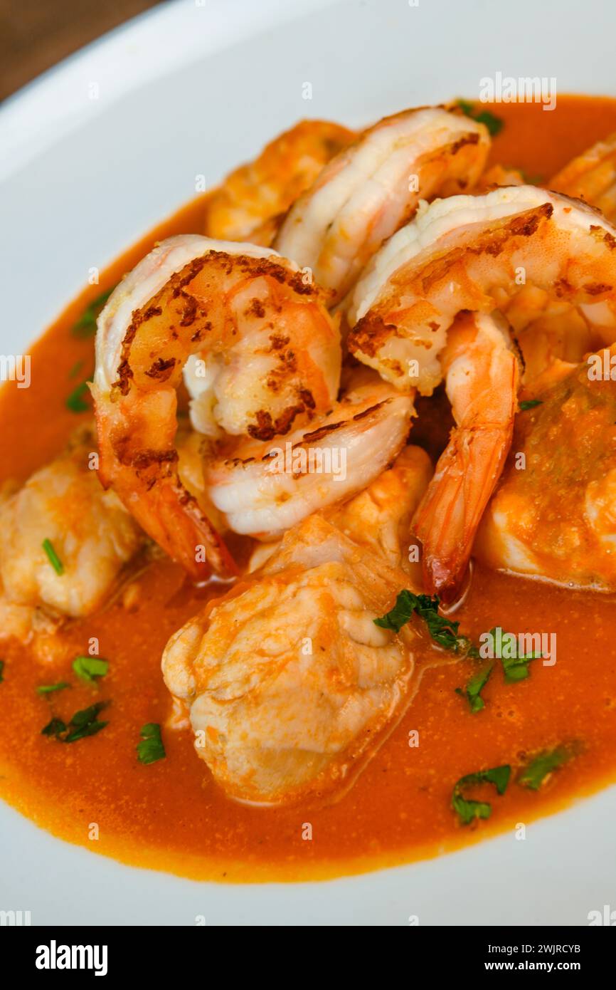 Recipe for Armorican-style monkfish tail, prawns, flambees with cognac ...