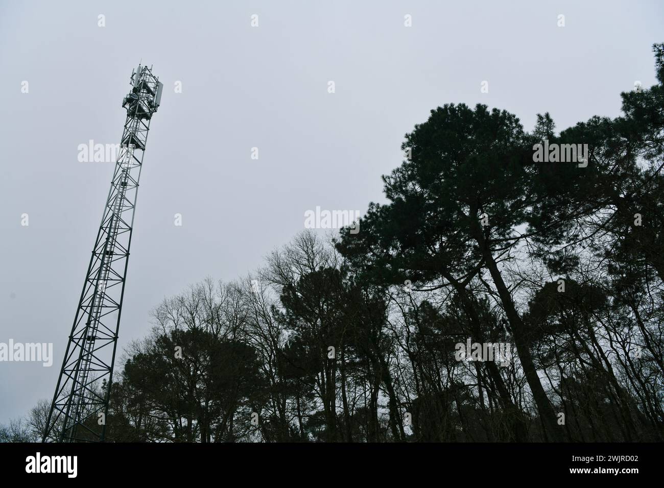 Deployment of the 5G network. Laying antennas on a mobile phone mast in ...