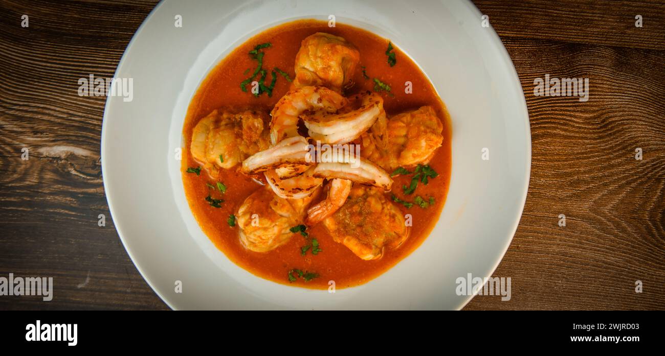Recipe for Armorican-style monkfish tail, prawns, flambees with cognac ...
