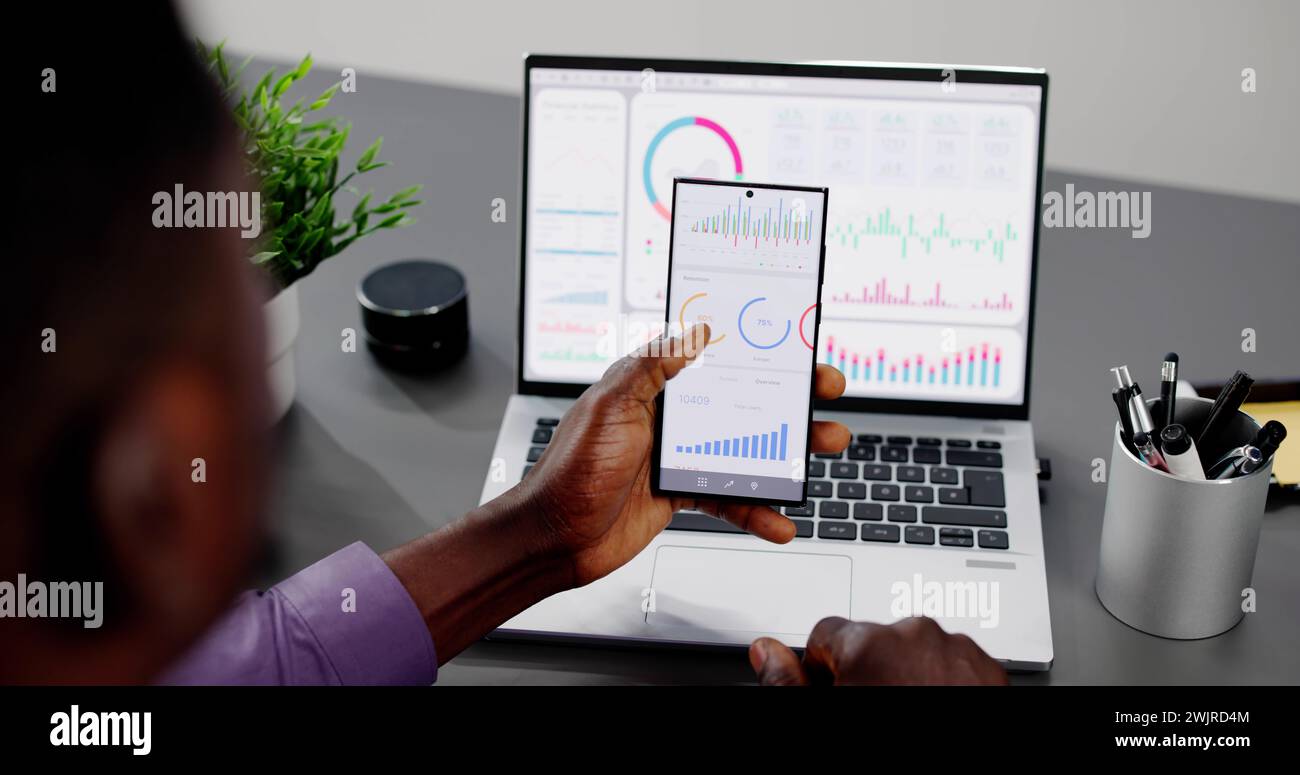 African American Data Analyst Using Data Analytics KPI Dashboard Stock ...