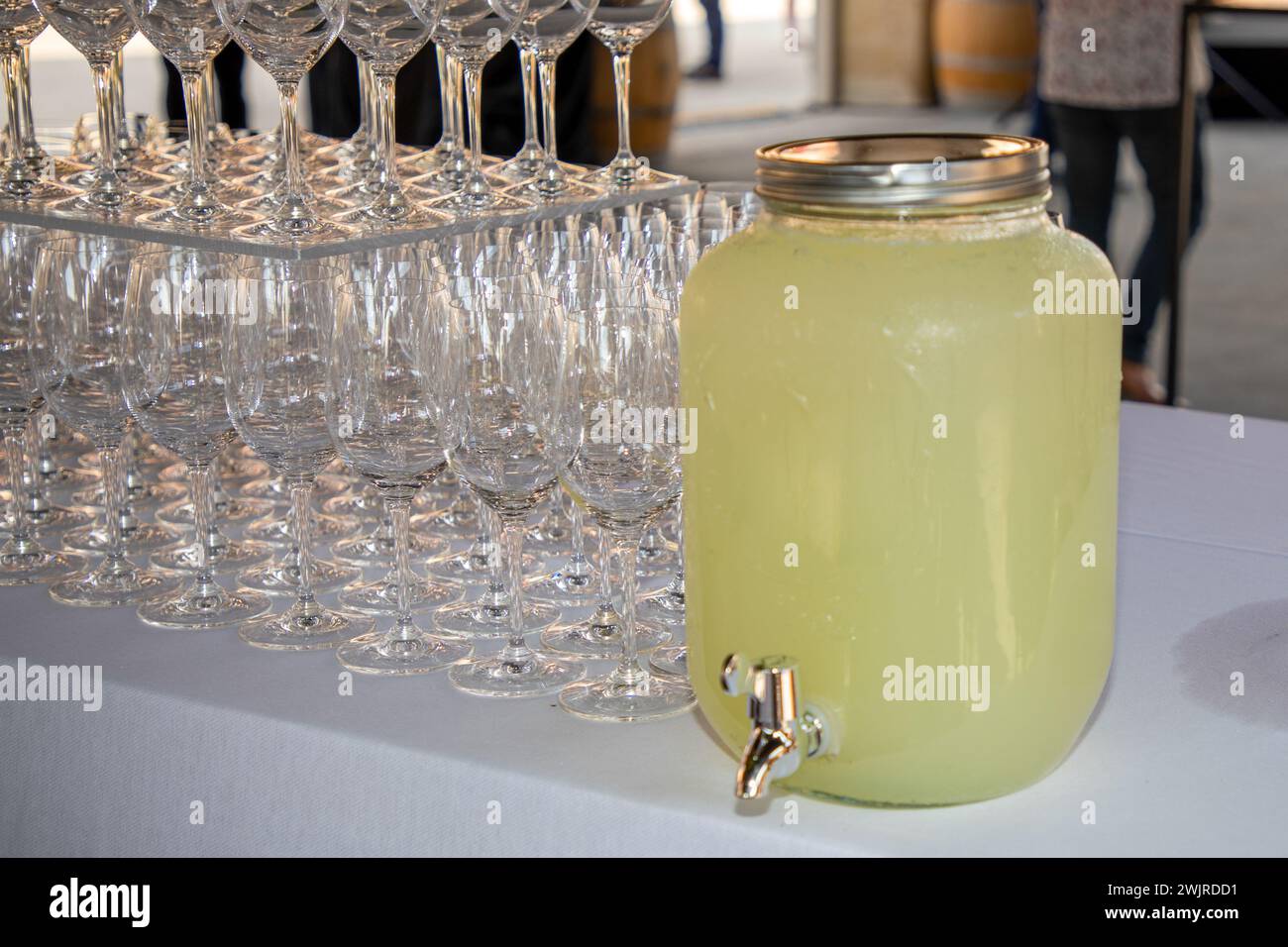 Fresh lemonade lemons lime in bottle beverage dispenser Stock Photo - Alamy