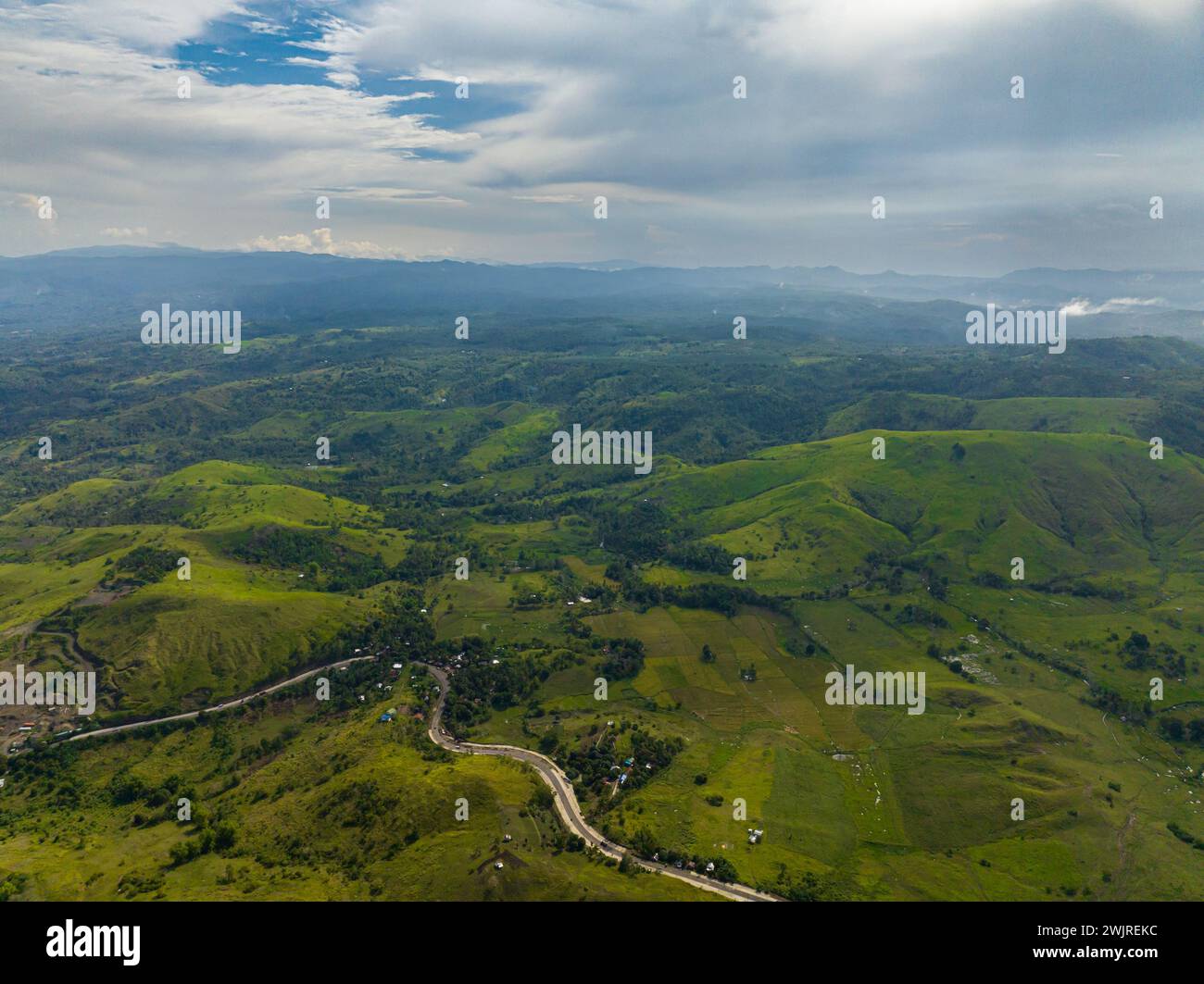 Top view of Mountain slopes with rainforest and agricultural land of ...