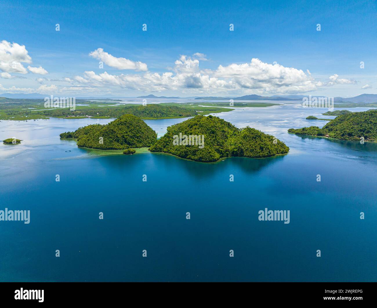 Seascape. Beautiful deep blue sea with islands under blue skies and ...