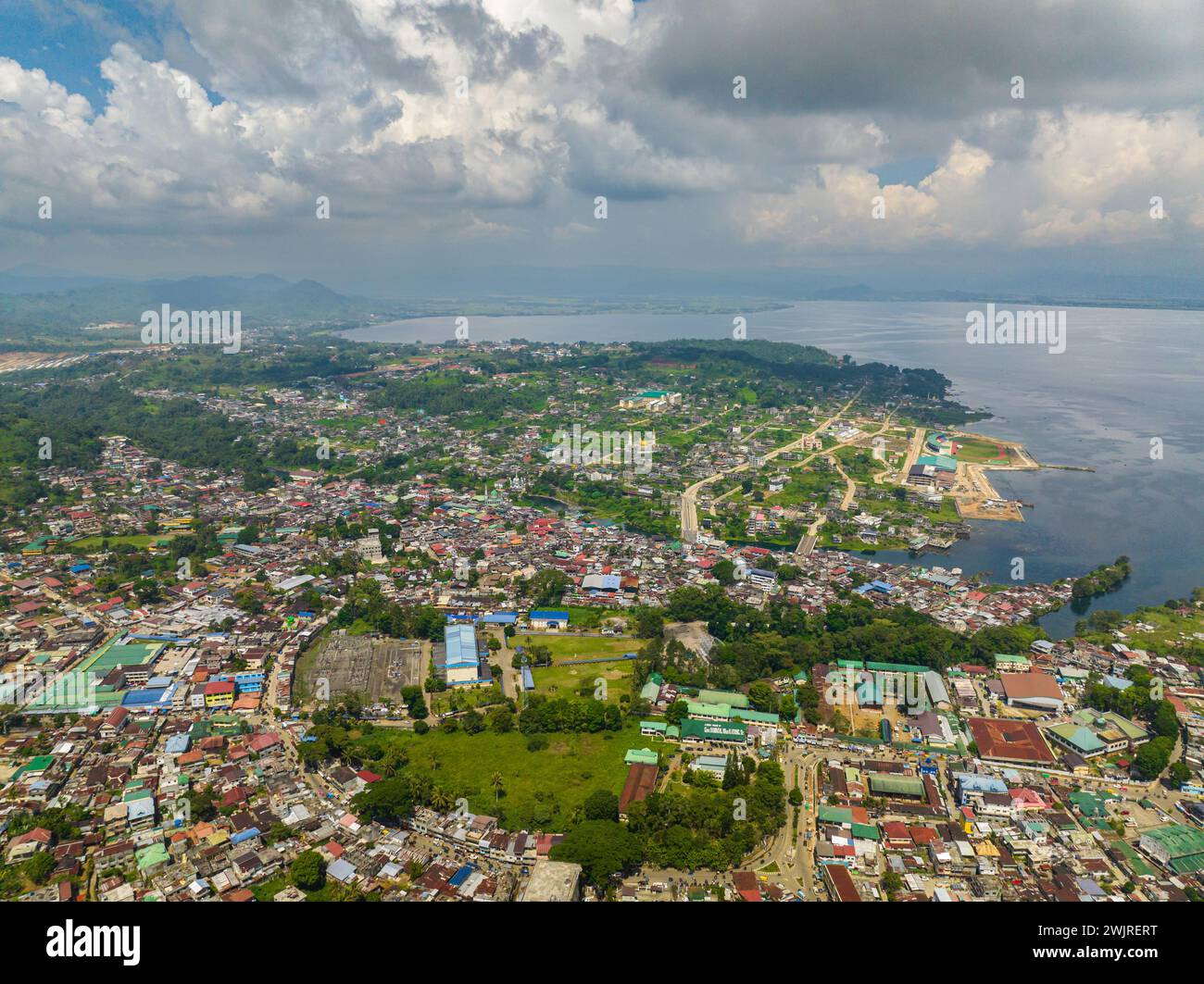Residential area in Marawi City with blue sky and clouds. Lanao del Sur. Mindanao, Philippines ...