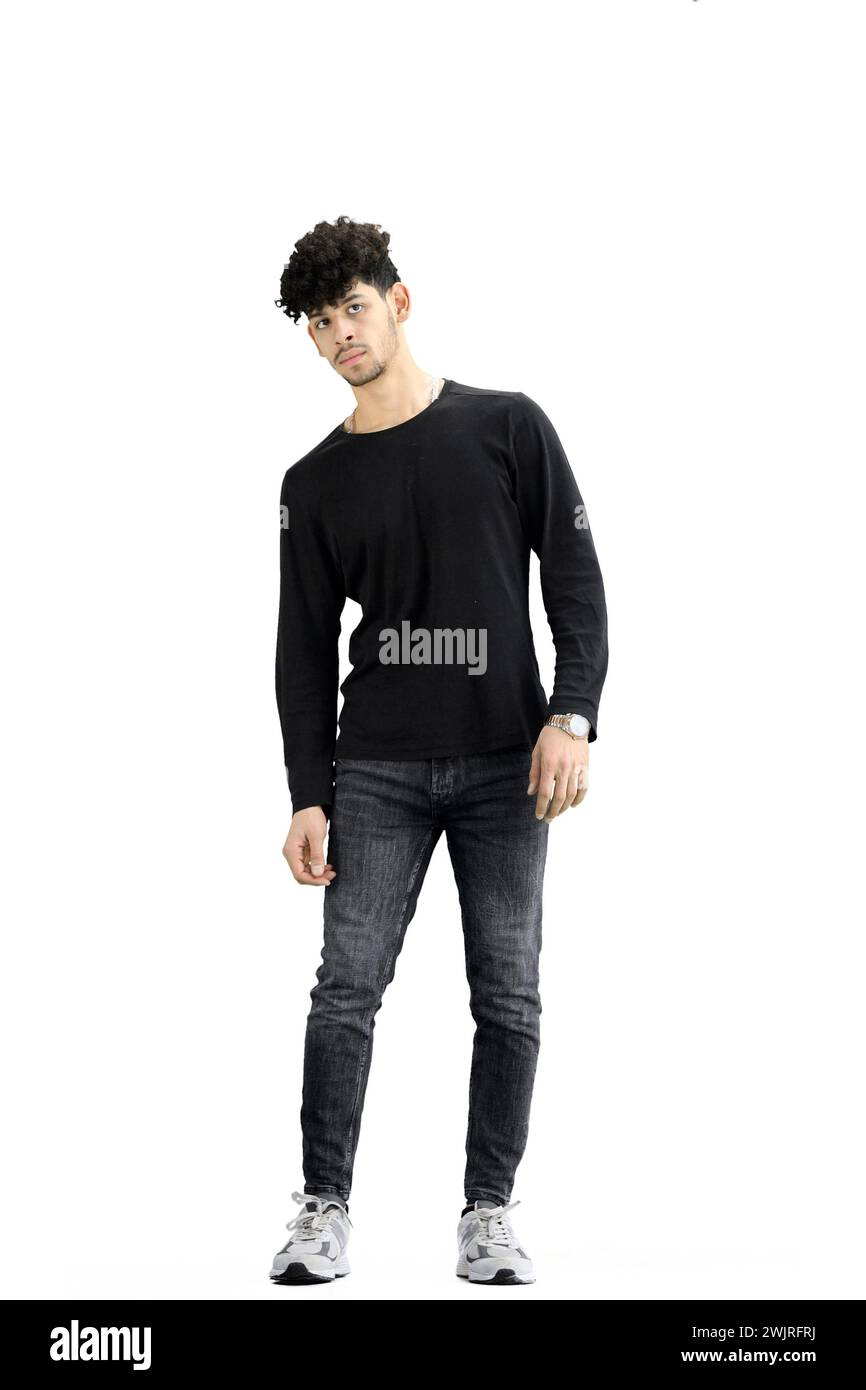 A man, on a white background, in full height, look at the distance ...
