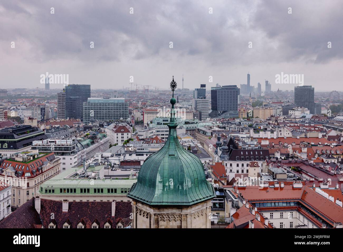An aerial view of the cityscape of Vienna, Austria on a cloudy day ...