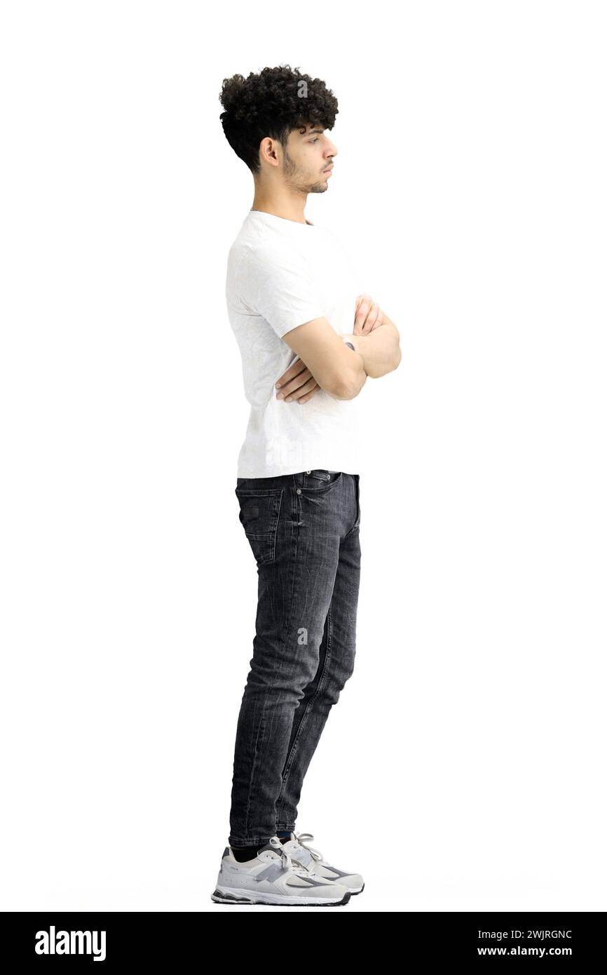 A man, on a white background, in full height, crossed his arms Stock ...