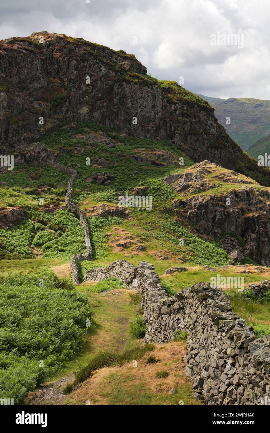 Dry-stone wall and Side Pike overlooking Langdale Pike, Lake District ...