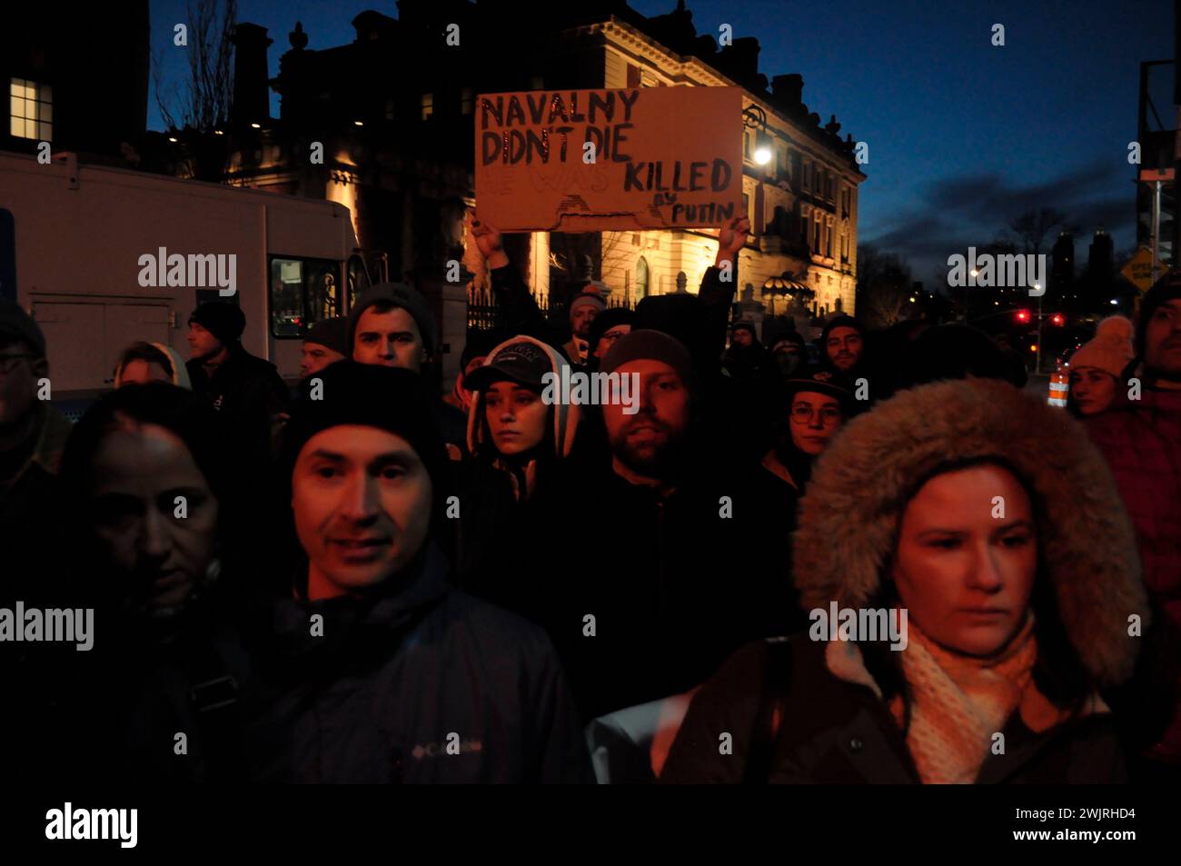 A demonstrator holds a placard at a vigil for Navalny. The vigil took ...