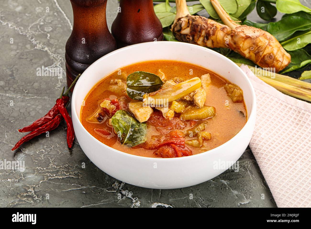 Thai traditional Tom Yum spicy soup with chicken Stock Photo - Alamy