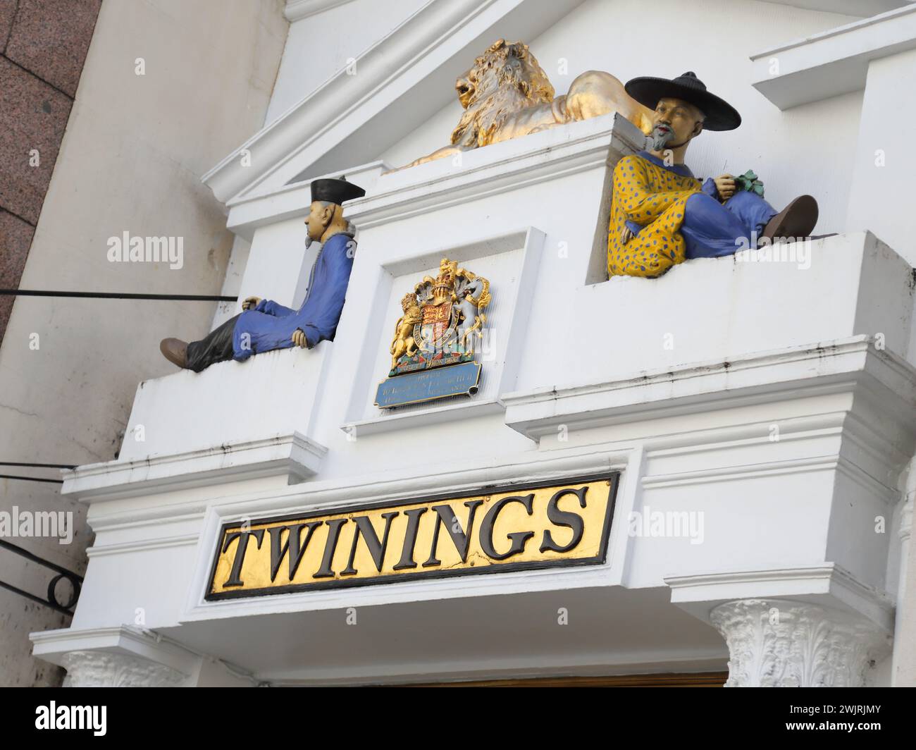 Sculptures above the entrance to the historical Twinings tea shop ...