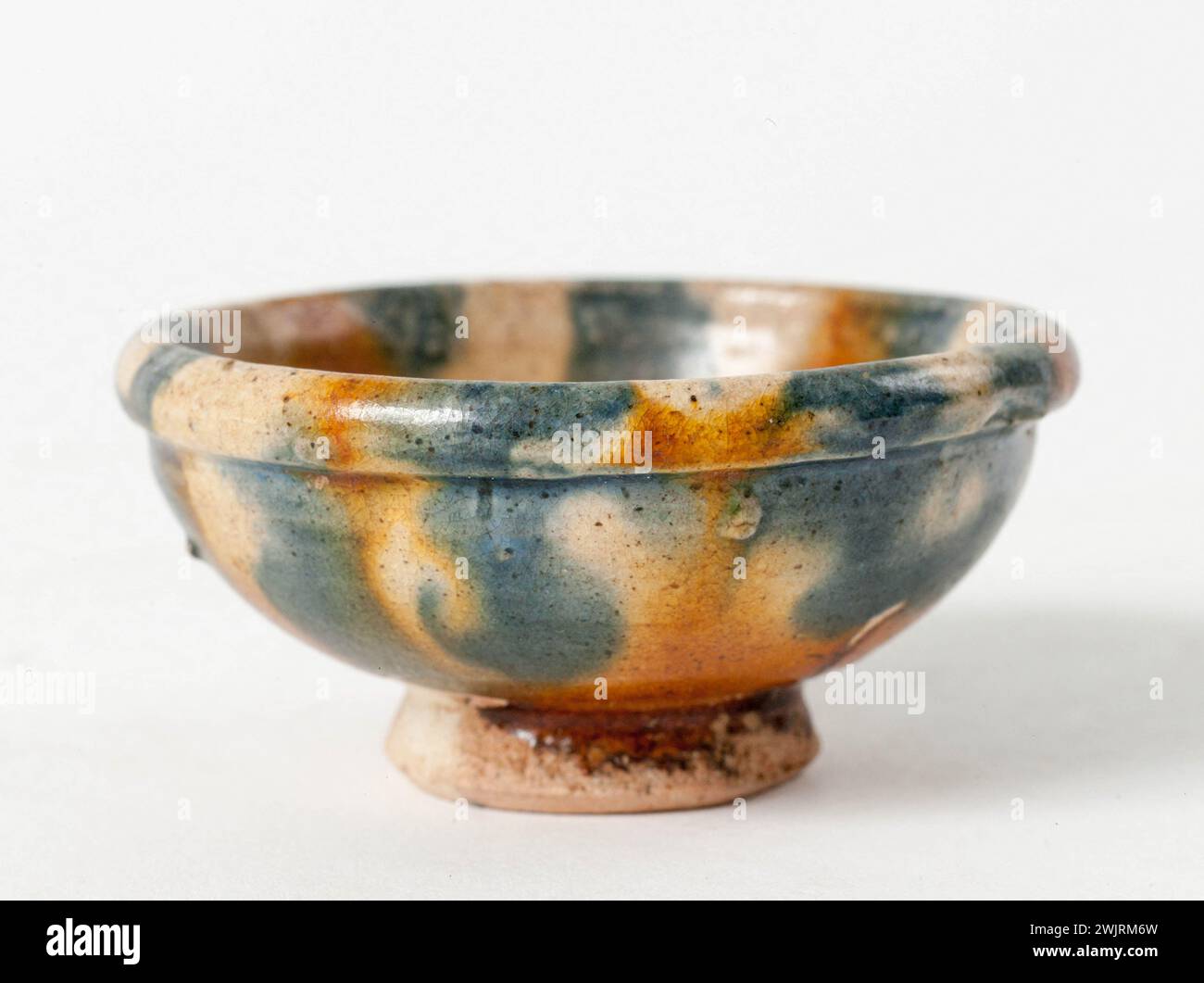 Cup ". Terracotta, brown, blue and white glaze (Sancai). China, Tang ...