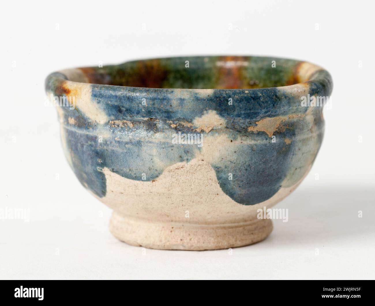 Cup ". Terracotta, brown, blue and white glaze (Sancai). China, Tang ...