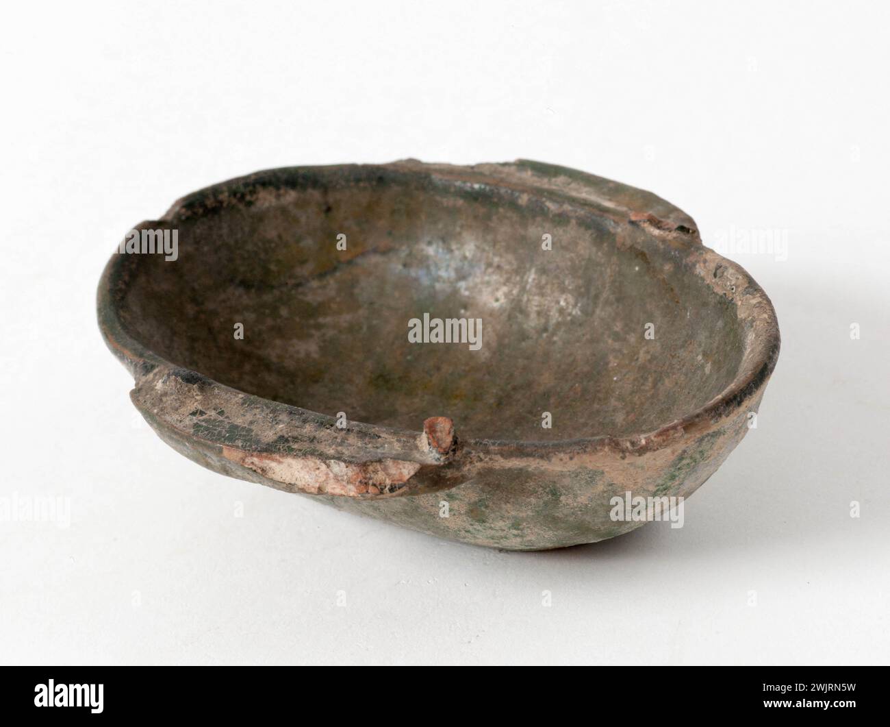 Ear cut ". Terracotta with green lead glaze. Han dynasty (206 BC-220 AD ...
