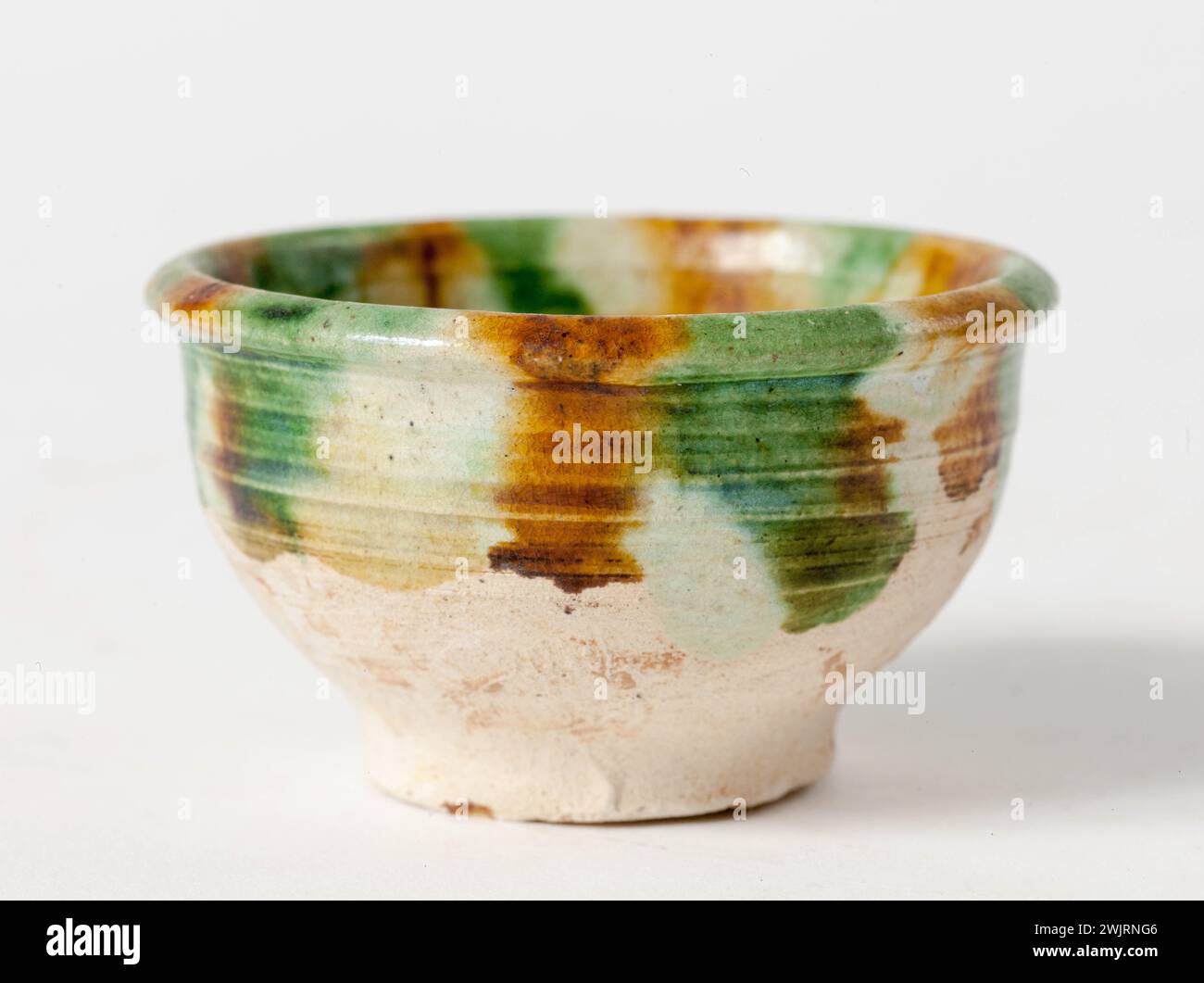 Cup ". Terracotta with brown, green and white glaze (Sancai). China ...