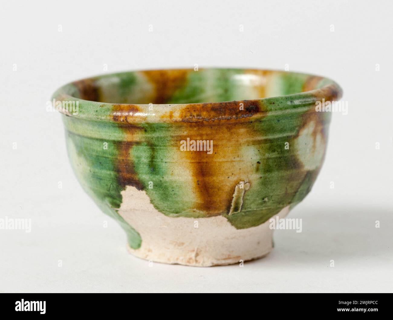 Cup ". Terracotta, brown, green and white glaze (Sancai). China, Tang ...