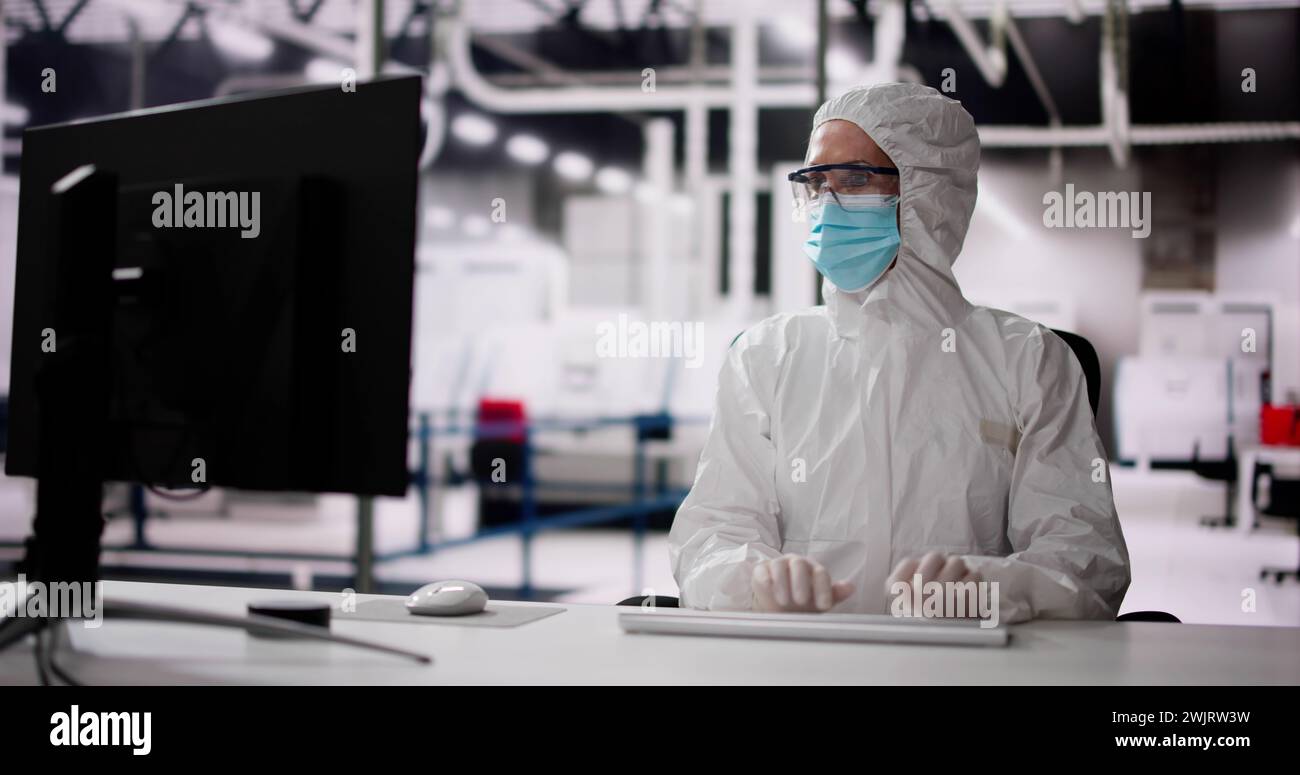 Sterile Semiconductor Manufacturing Factory And Worker In Coverall ...