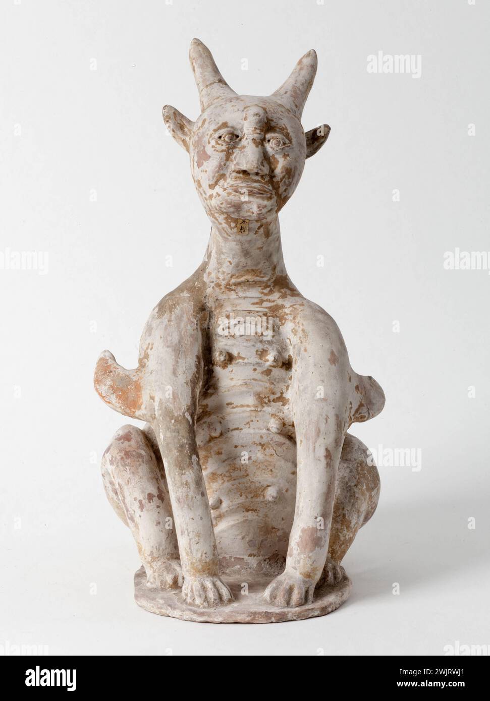 Guardian spirit of a human face ”. Terracotta, traces of white slip ...
