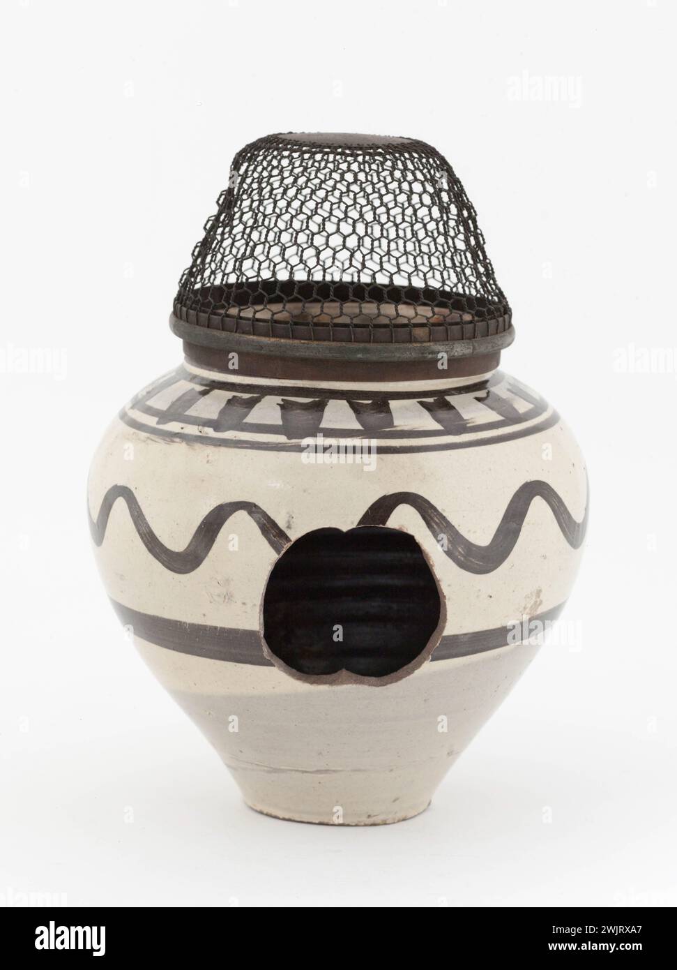 Jar and lid ". Terracotta coated with slip -in -brown cream under ...