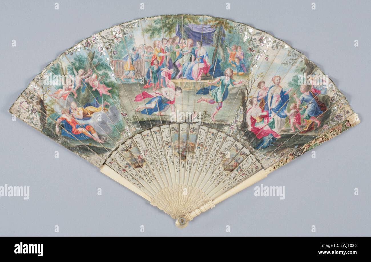 Folded fan, Facing decor: the central scene shows a couple sitting ...