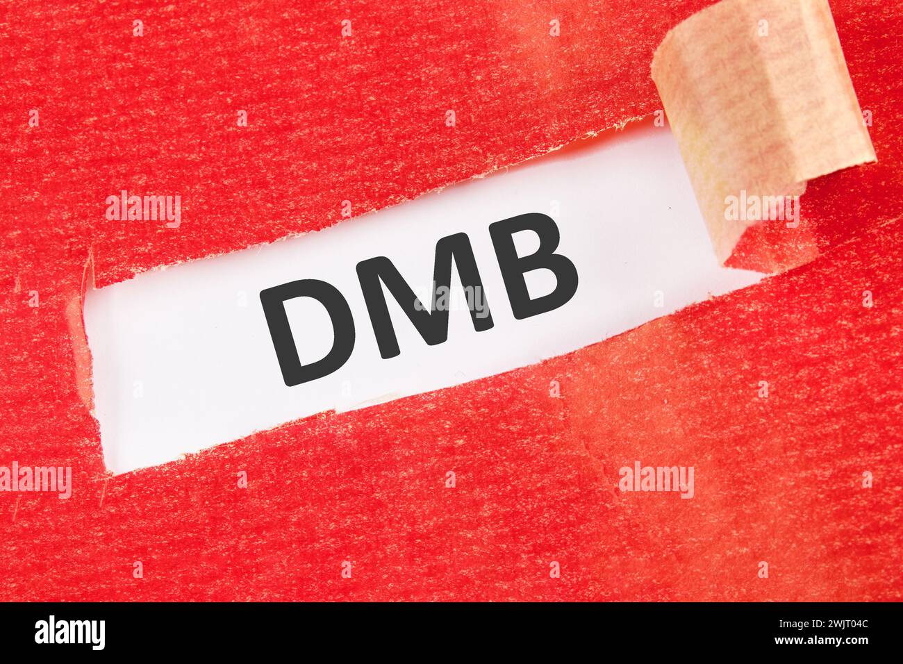 DMB the inscription under the torn paper on a white background Stock ...