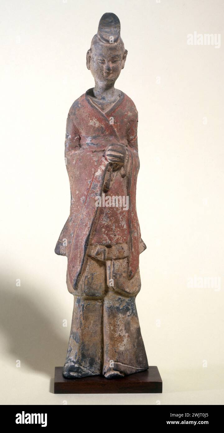 Terracotta standing officer (Mingqi). China, era of the Northern Wei, 386-534. Paris, Cernuschi ...