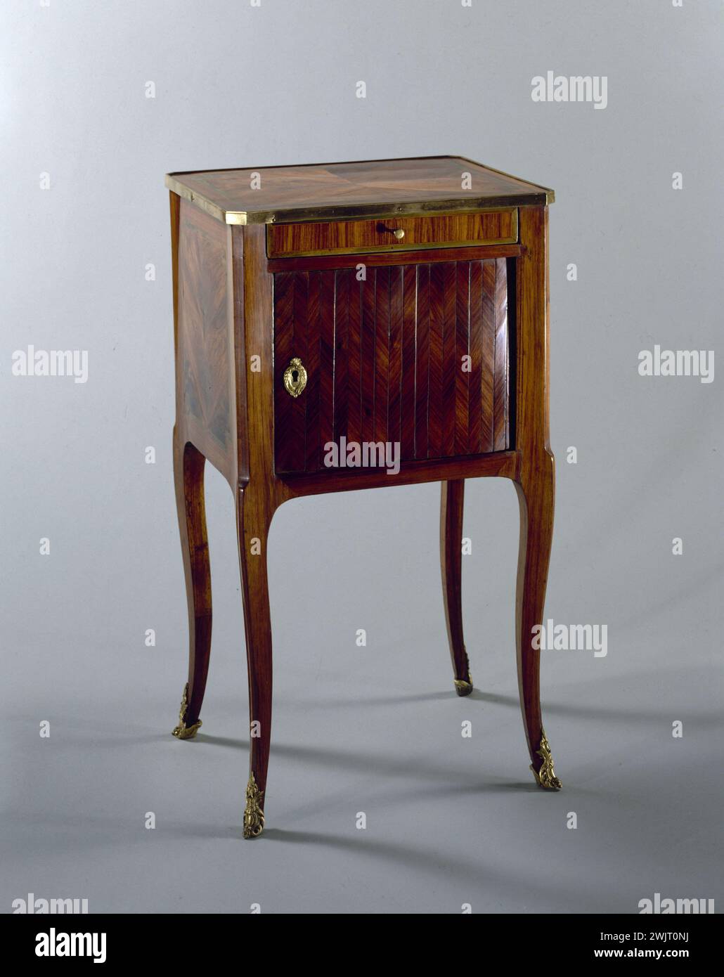 Anonymous. Bedside table with sliding curtain in oak, walnut drawer, golden bronzes (overview on ...