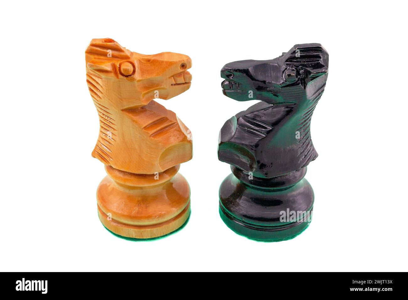 Two chess knights, black and white, facing each other Stock Photo - Alamy