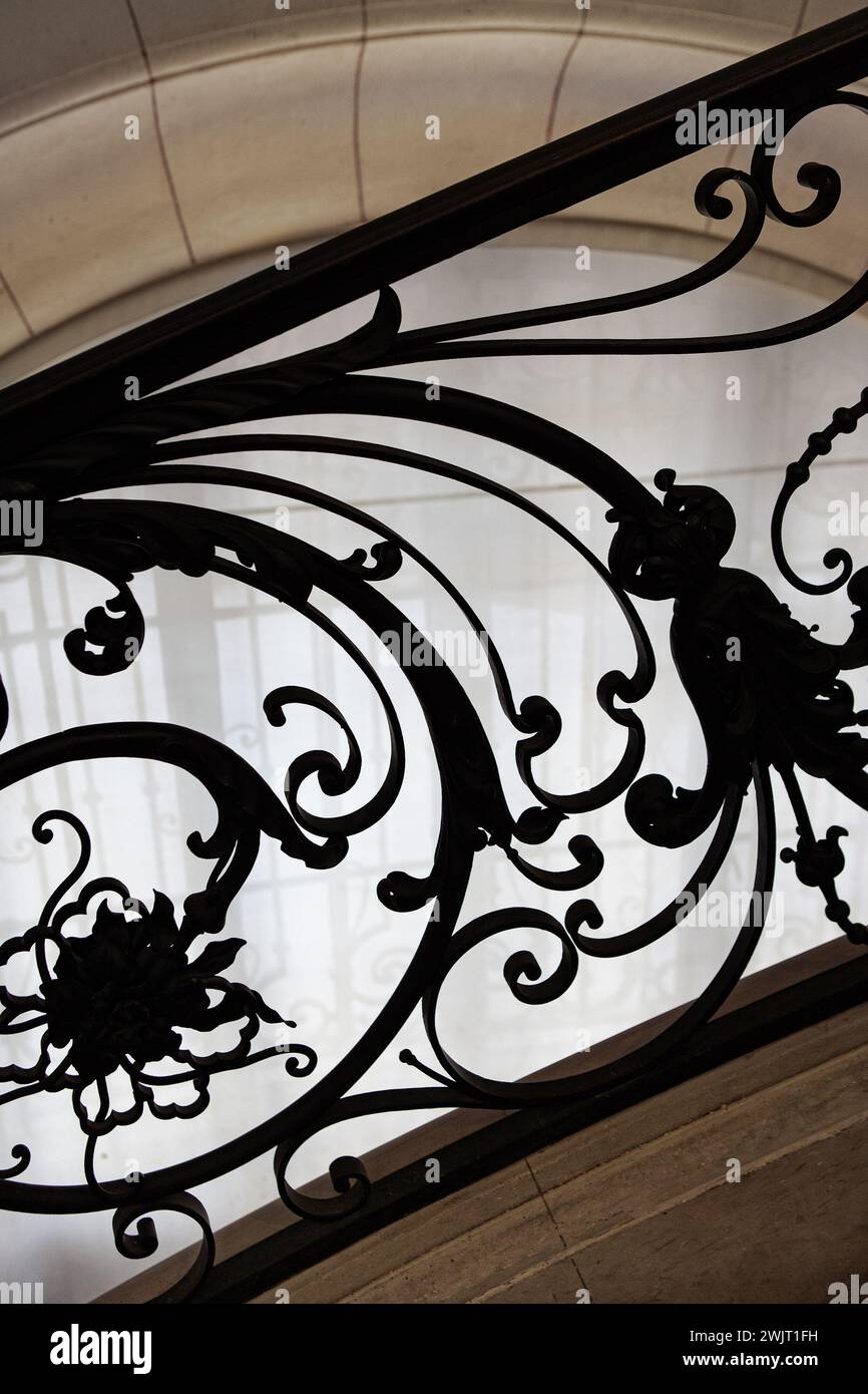 Detail of a wrought iron stair railing Stock Photo - Alamy